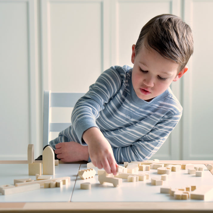 Asymbol: A creative game for family game night – SimplyFun