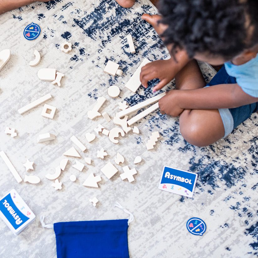 Asymbol: A creative game for family game night – SimplyFun